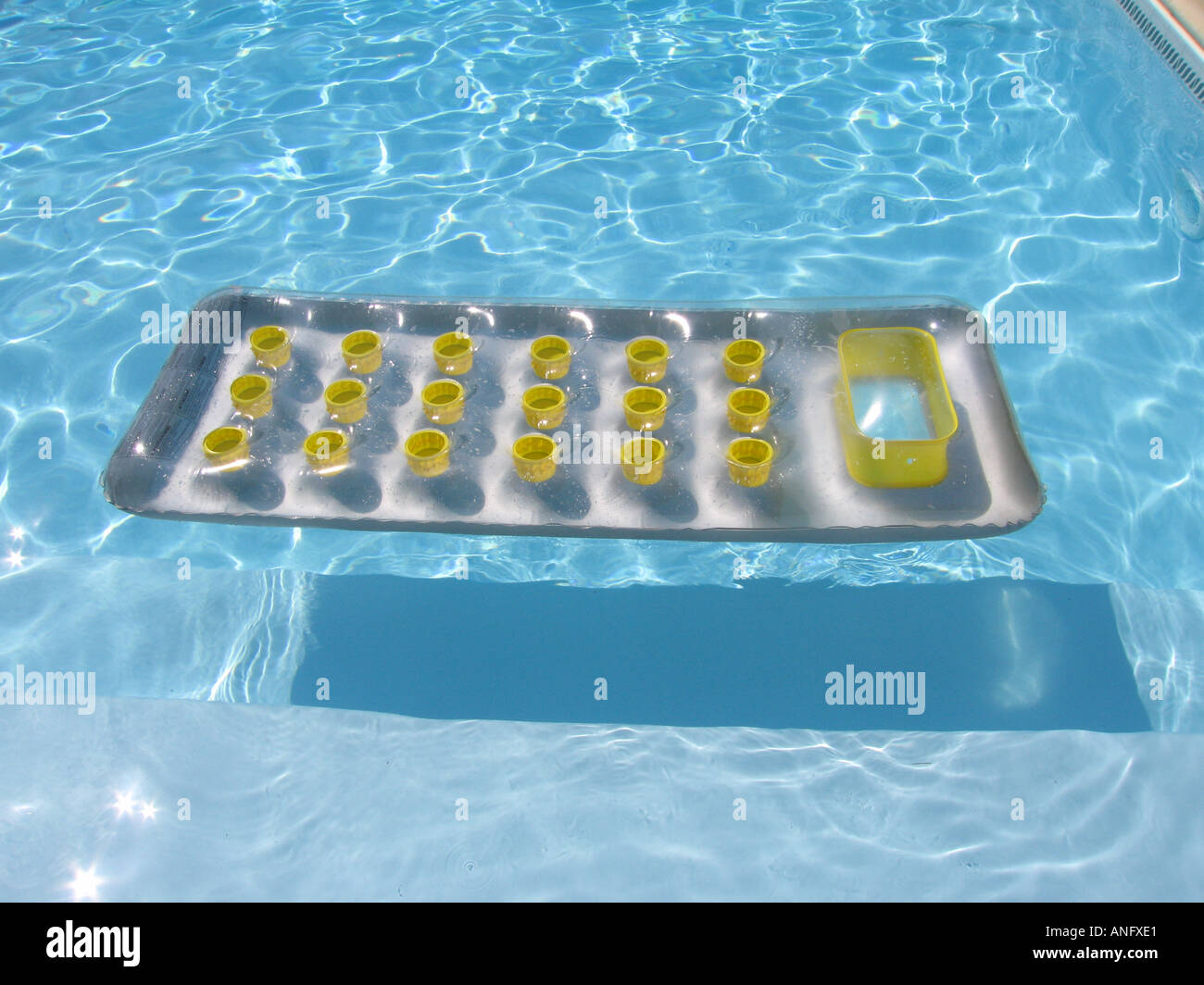 lilo in swimming pool france Stock Photo - Alamy