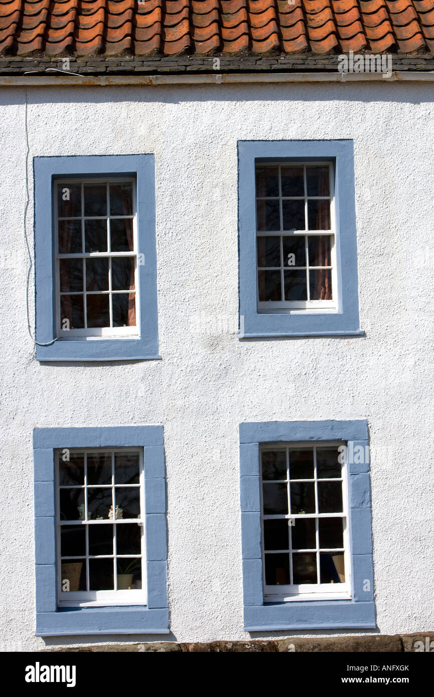Blue window sill on front of House Stock Photo - Alamy