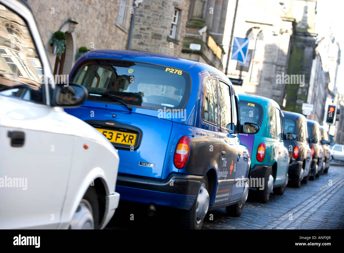 Row of black cab taxi rank Stock Photo - Alamy