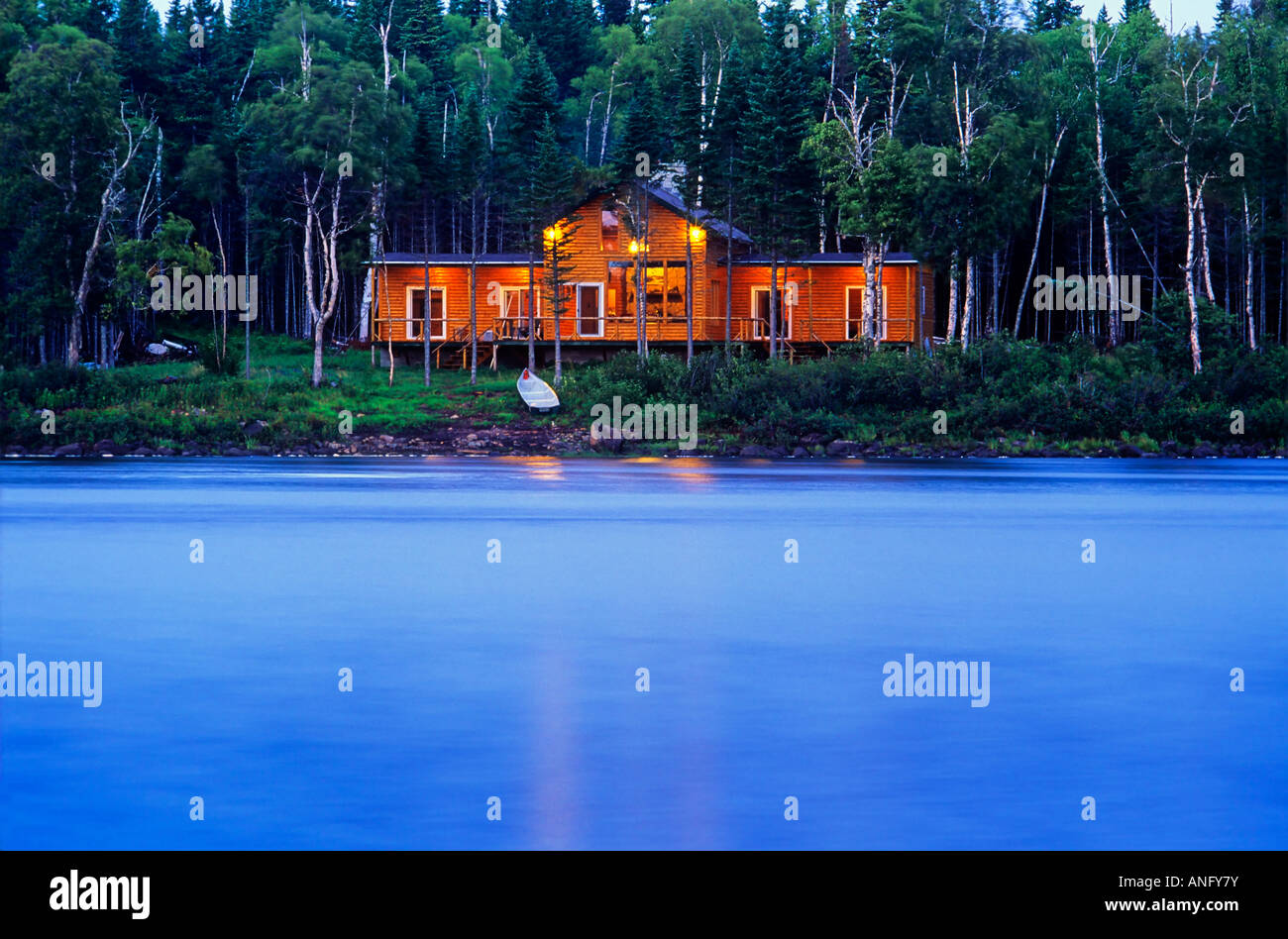 Silver Mountain Lodge at dusk, Upper Humber River, Newfoundland, Canada ...