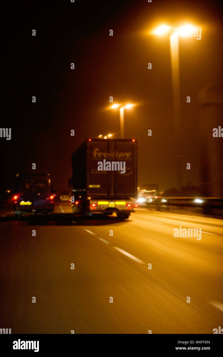 HGV on Motorway at Night Time Stock Photo - Alamy