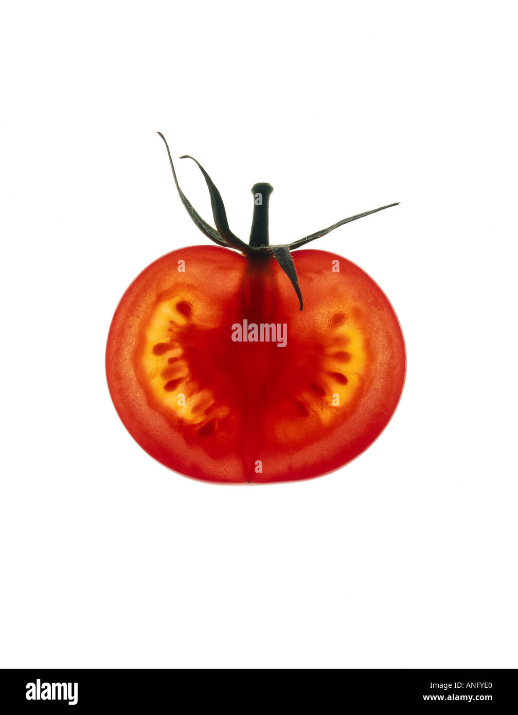 Tomato slice on white Stock Photo - Alamy