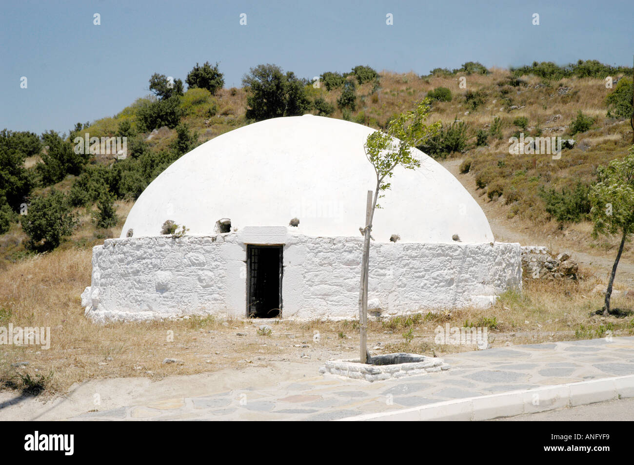 Traditional local Turkish water reservoir on the hill between Bodrum ...