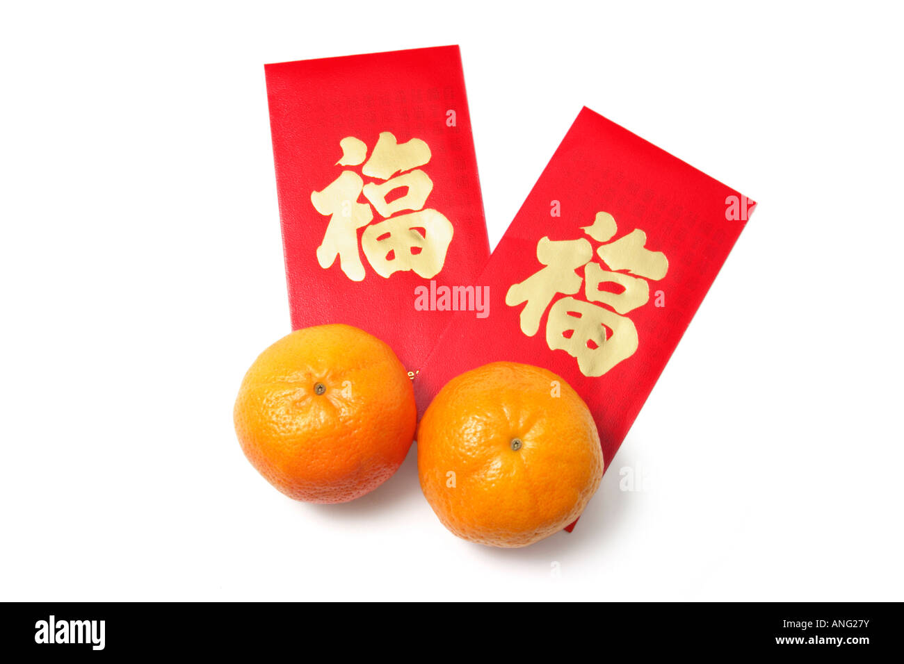 Chinese New Year Red Packets and Mandarins Stock Photo - Alamy