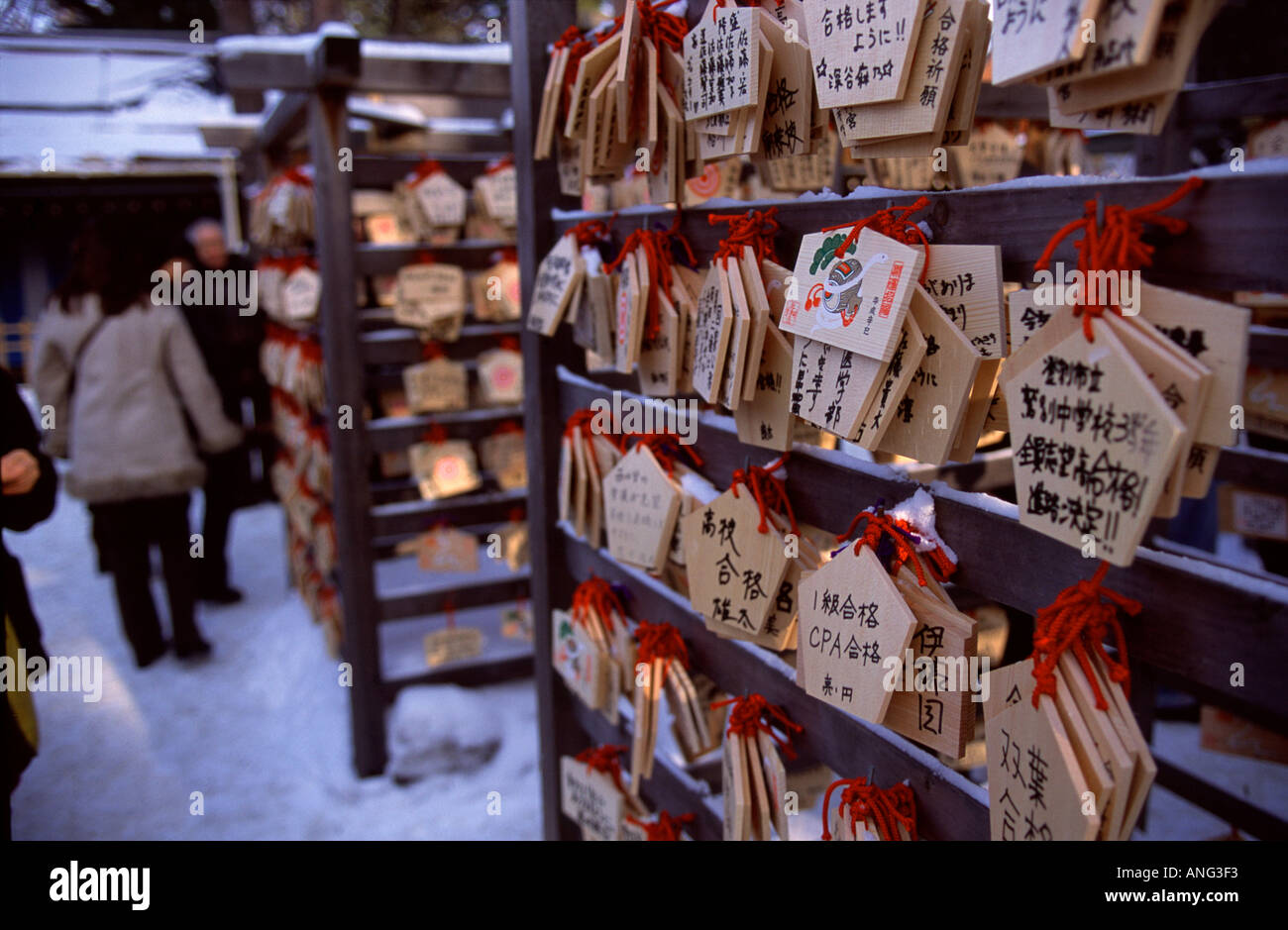 Wooden cards known as 'ema' contain written wishes to the gods, in ...