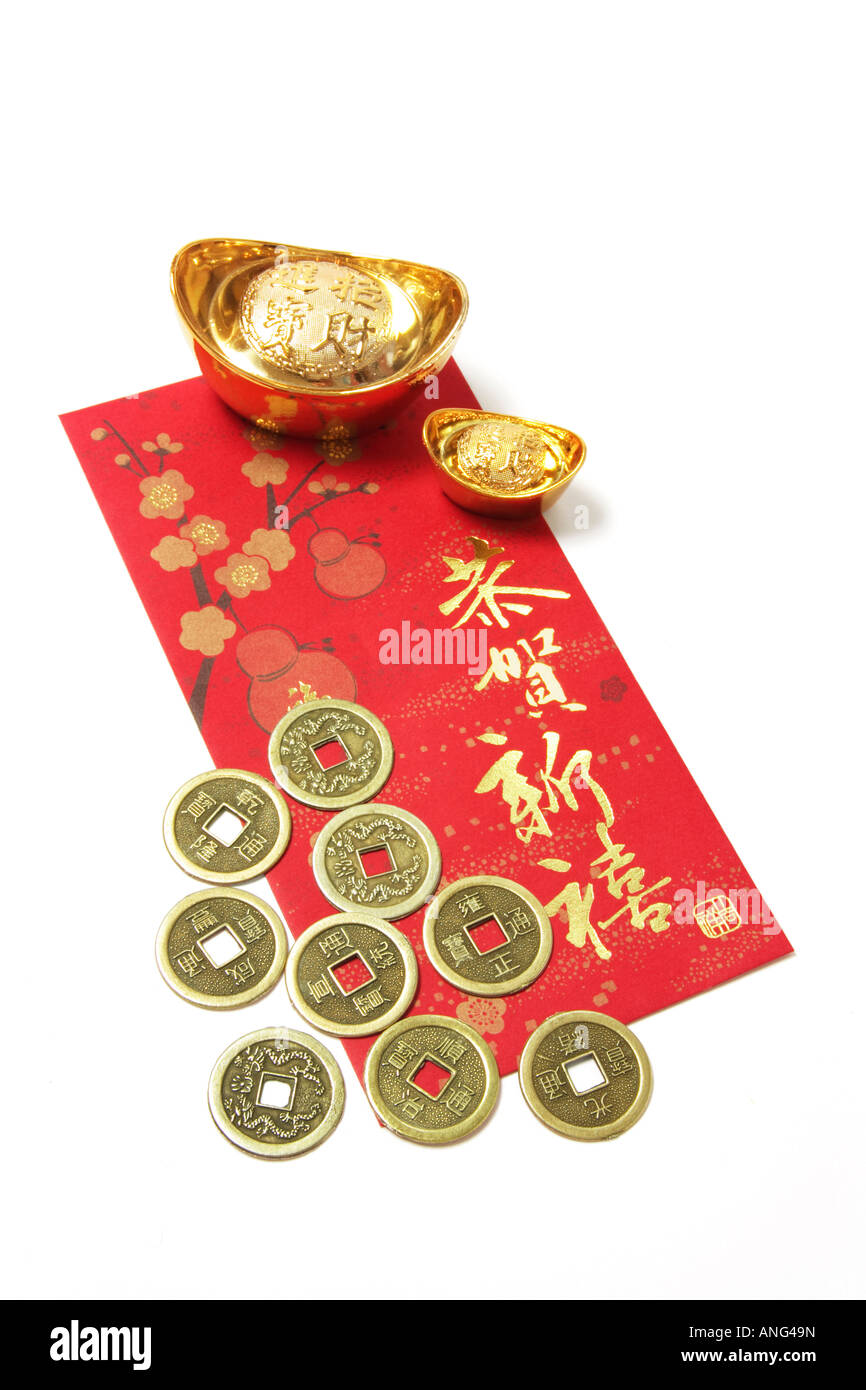 Chinese Coins and Gold Ingots on Red Packet Stock Photo - Alamy