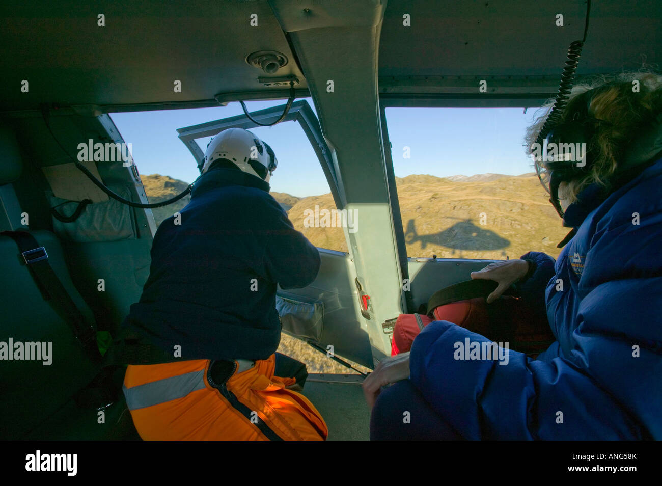 An Air Ambulance flying to a mountain rescue incident in the Lake ...