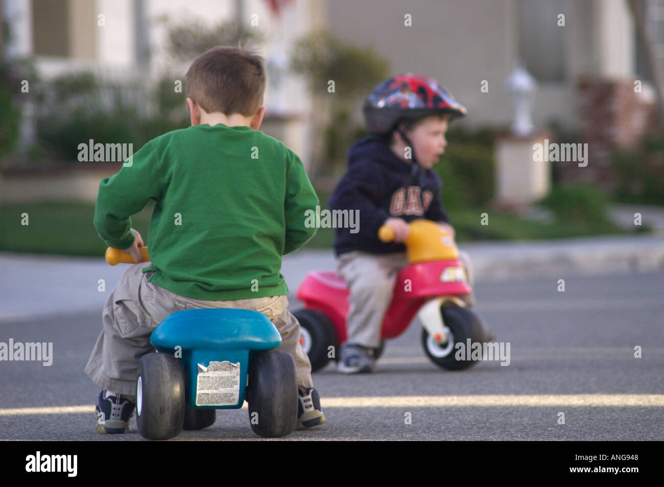 kids on toys Stock Photo - Alamy