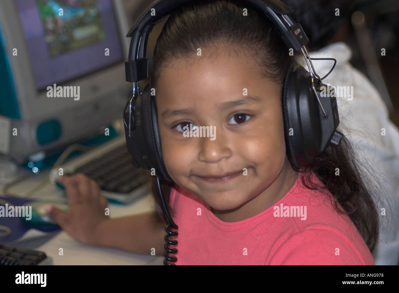 Hispanic student on computer Stock Photo - Alamy
