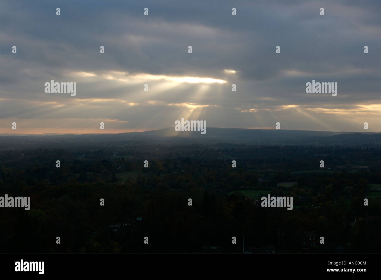 Sun rays and a dramatic Surrey landscape from the North Downs at ...