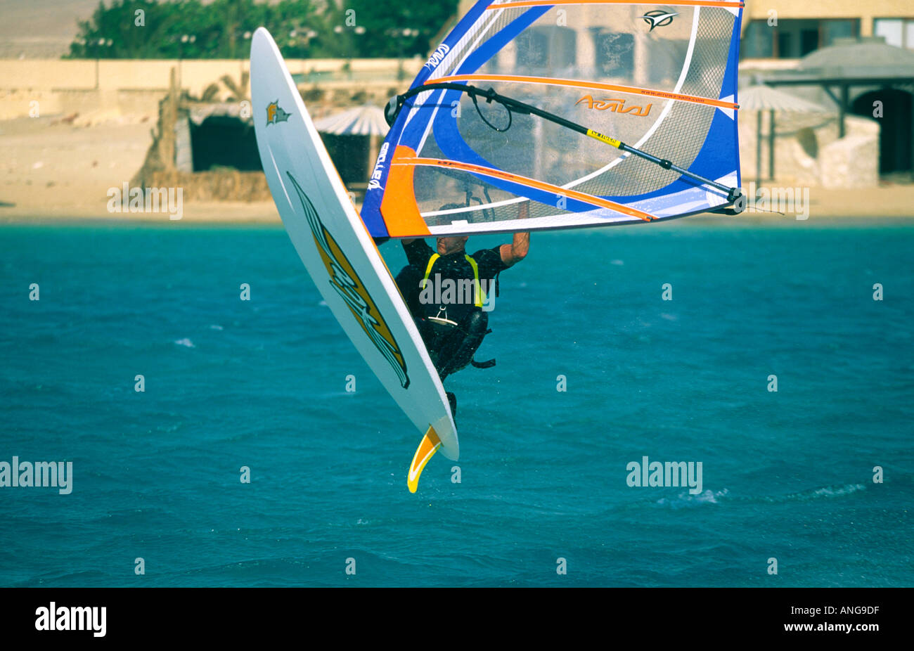 windsurfer airborne off light blue chop wave Red Sea Sinai Egypt Stock ...