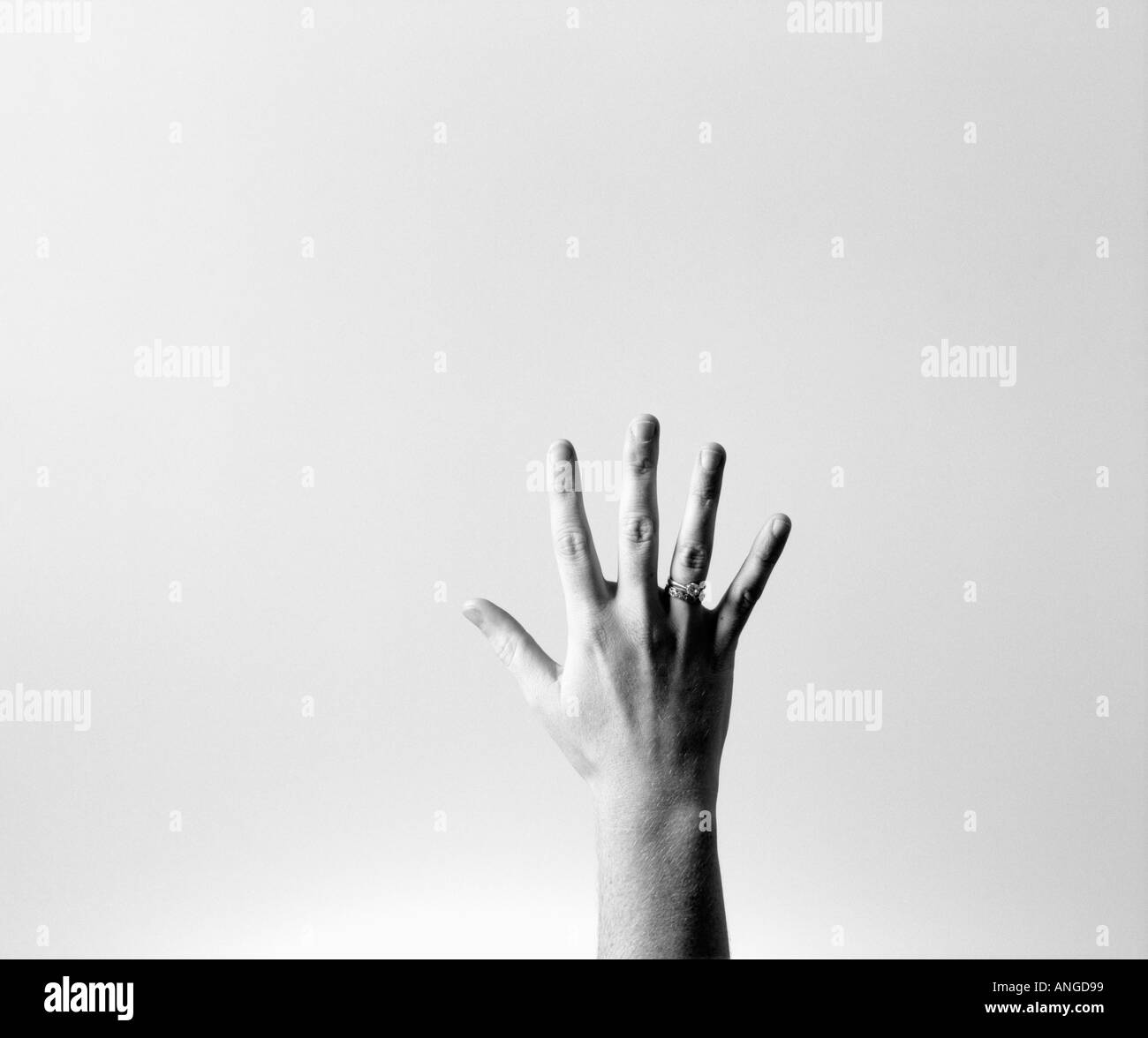 Hand arm in air Black and White Stock Photos & Images - Alamy