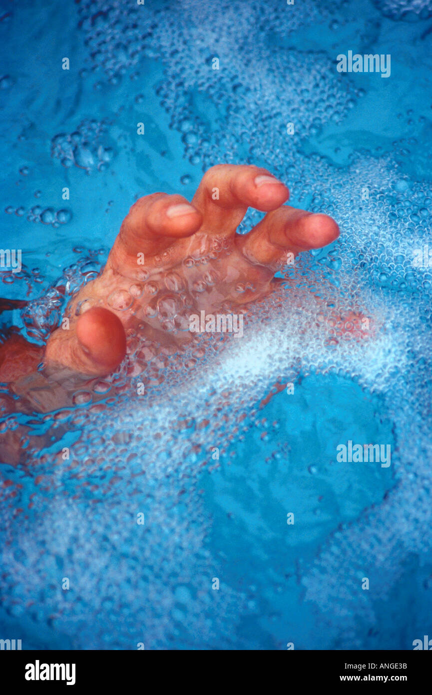 Hand Reaching Out of Water Stock Photo - Alamy