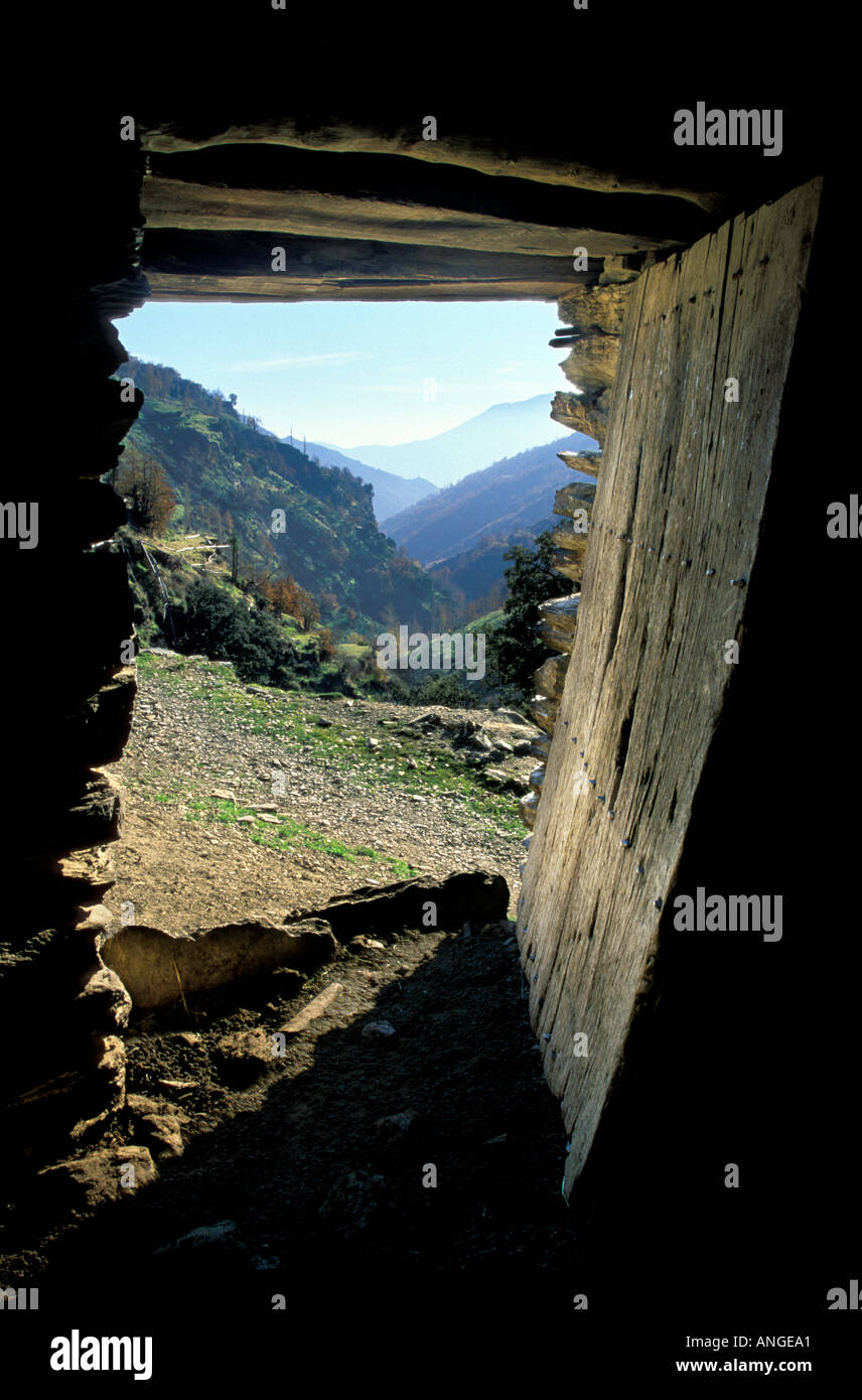 Rustic open door leading to a mountain scene Stock Photo - Alamy