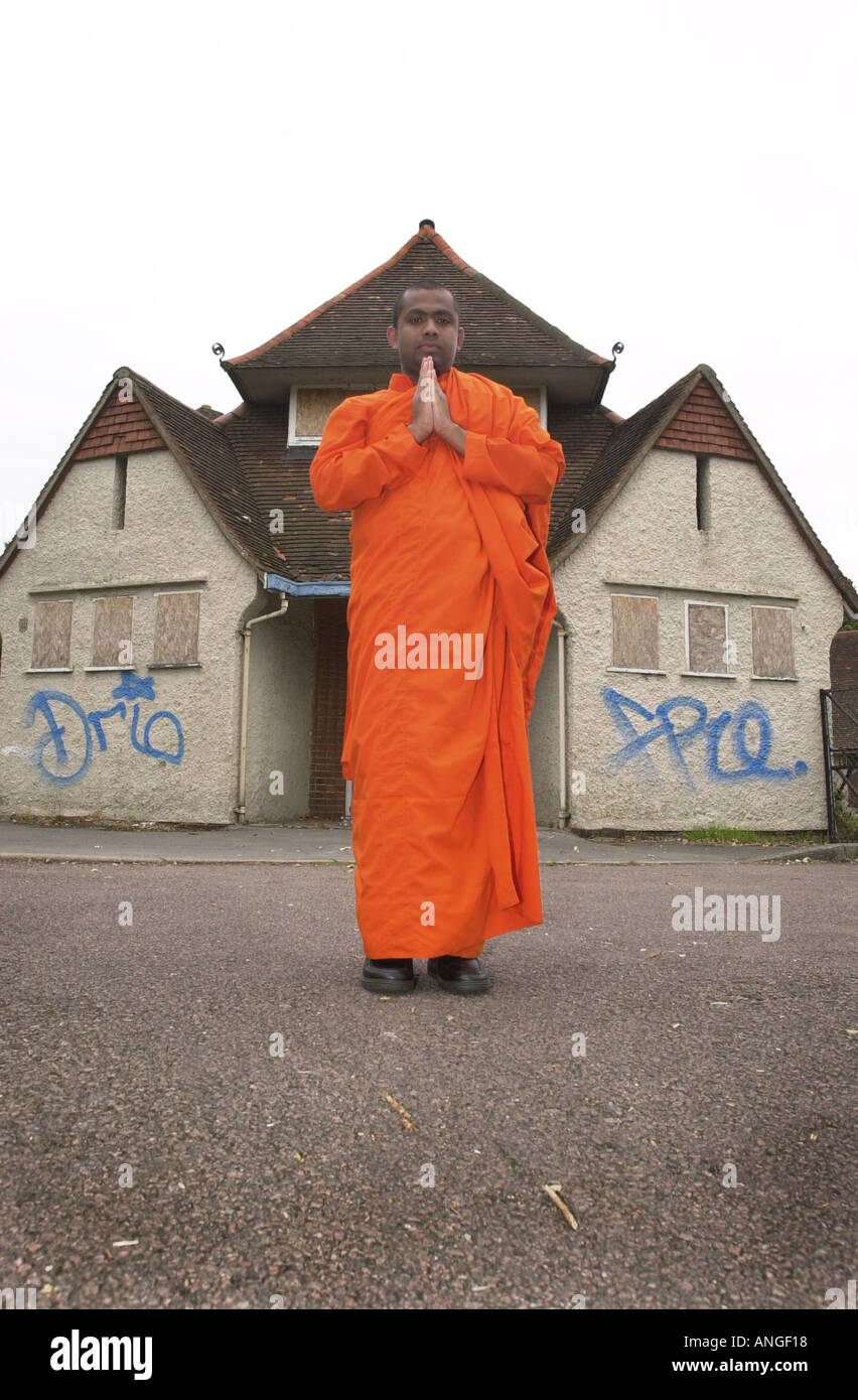 Buddhist prays outside the Howard Hall Letchworth UK Stock Photo - Alamy