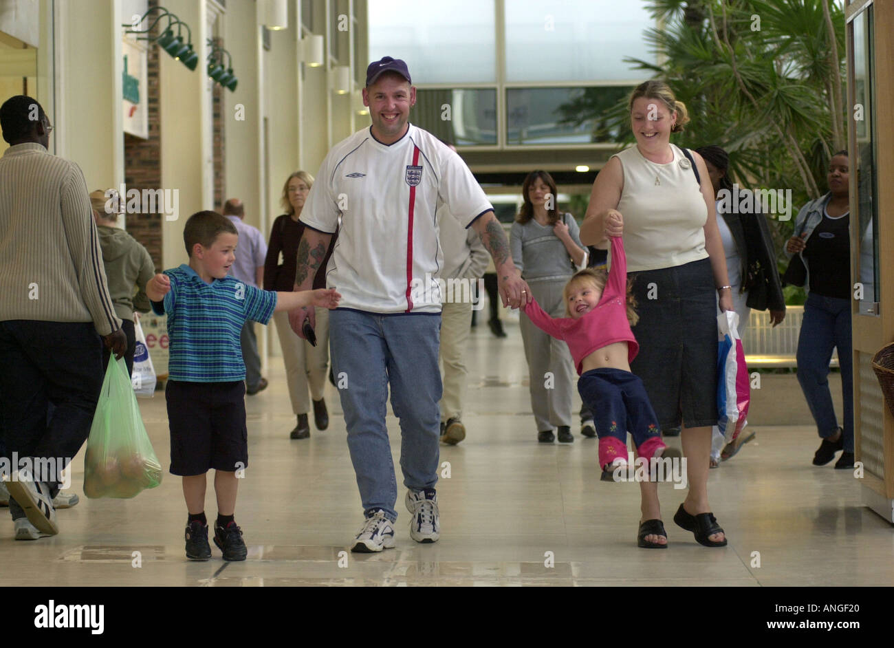A family walk through a shopping mall in Milton Keynes Europe s fatest ...