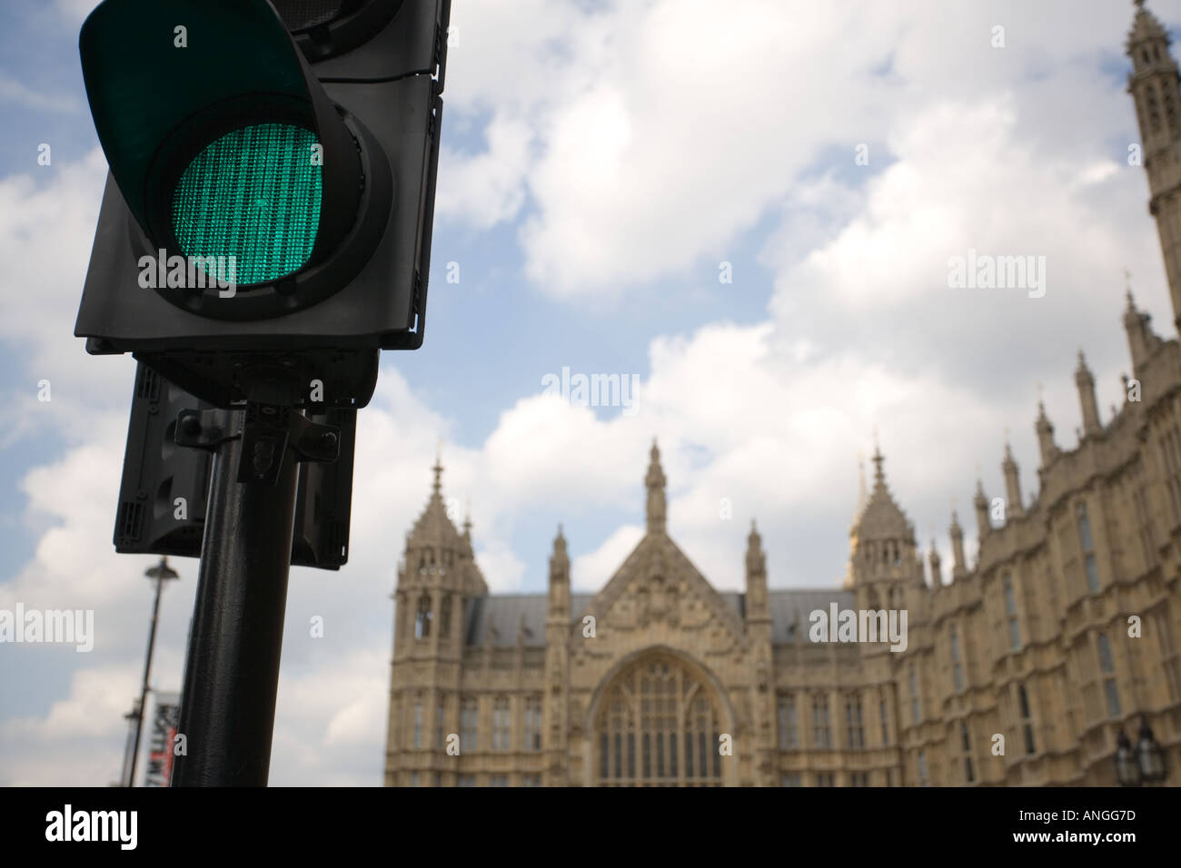 A green traffic light outside the Houses of Parliament Stock Photo - Alamy