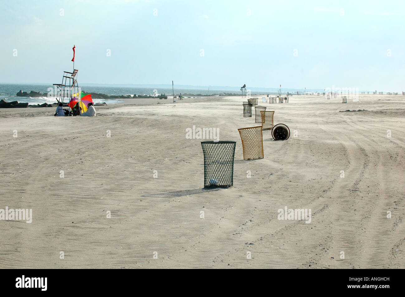 empty trash cans on a clean beach Stock Photo - Alamy