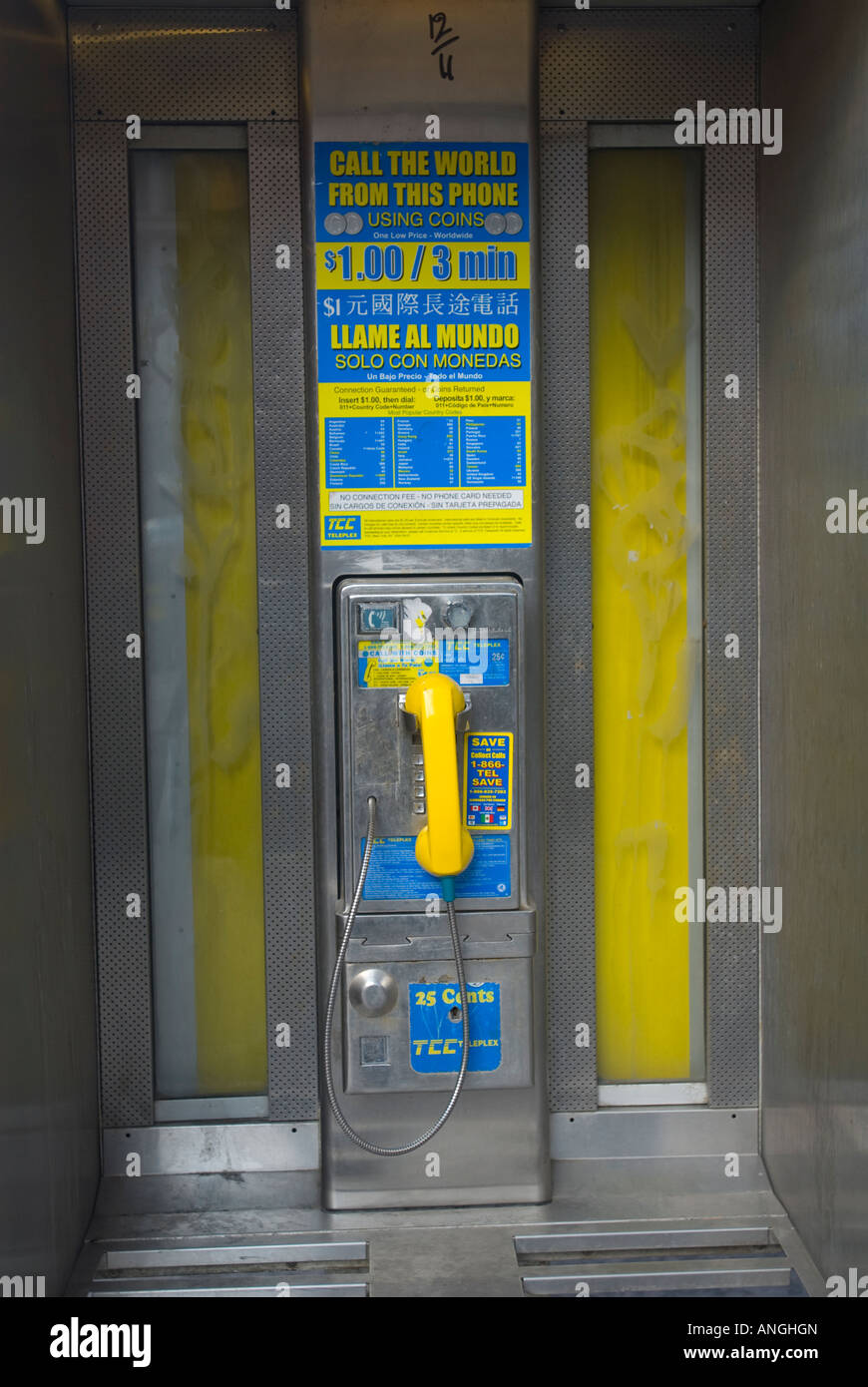 A public pay telephone advertising international calling Stock Photo ...