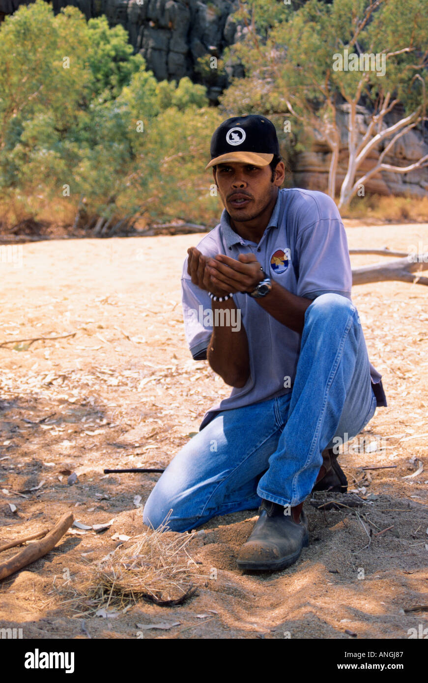 Aboriginal man starting fire hi-res stock photography and images - Alamy