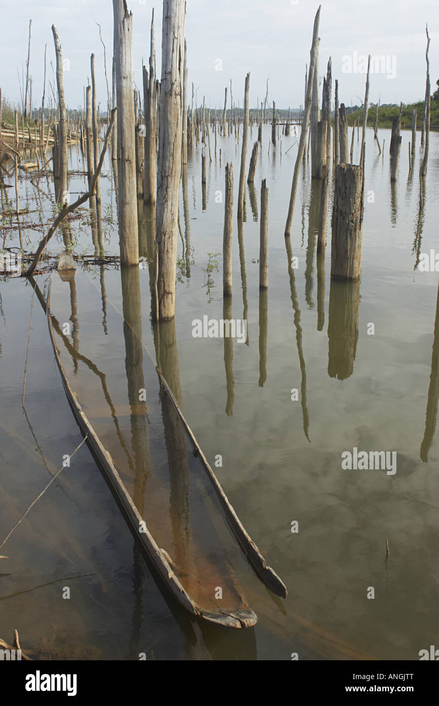 Dugout canoe underwater in the village of Lebidoti on the Brokopondo ...