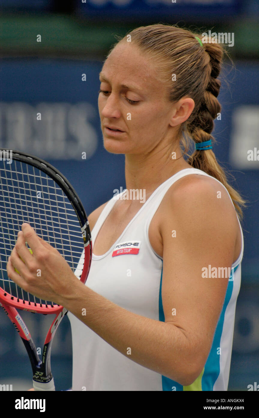 Mary Pierce adjusts her strings during the 2005 Acura Classic, which ...