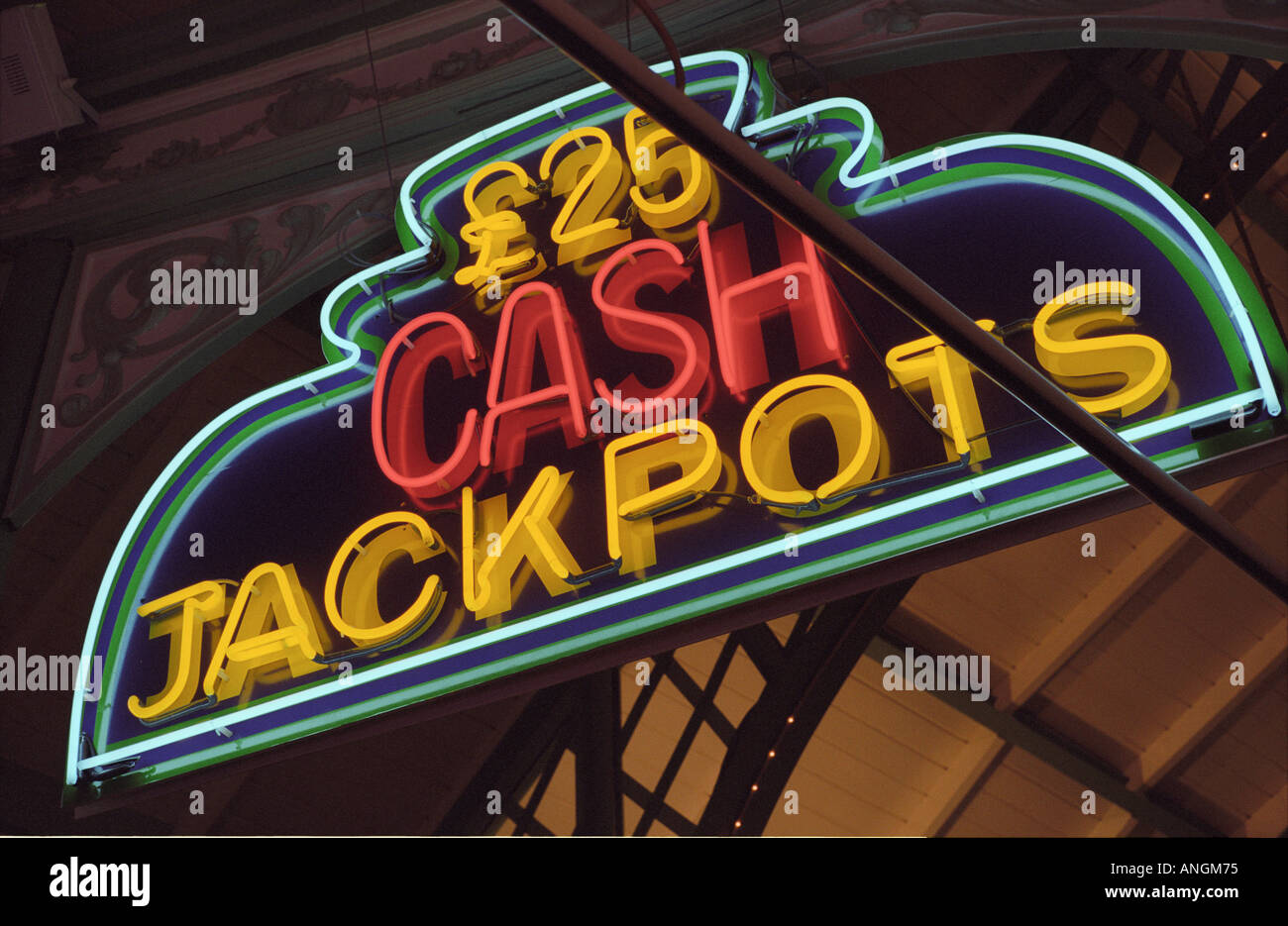 amusements brighton pier neon sign Stock Photo - Alamy