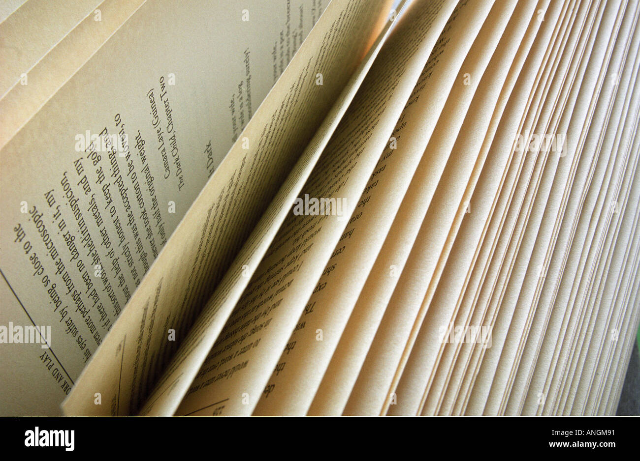 paper back with it s pages falling open Stock Photo - Alamy