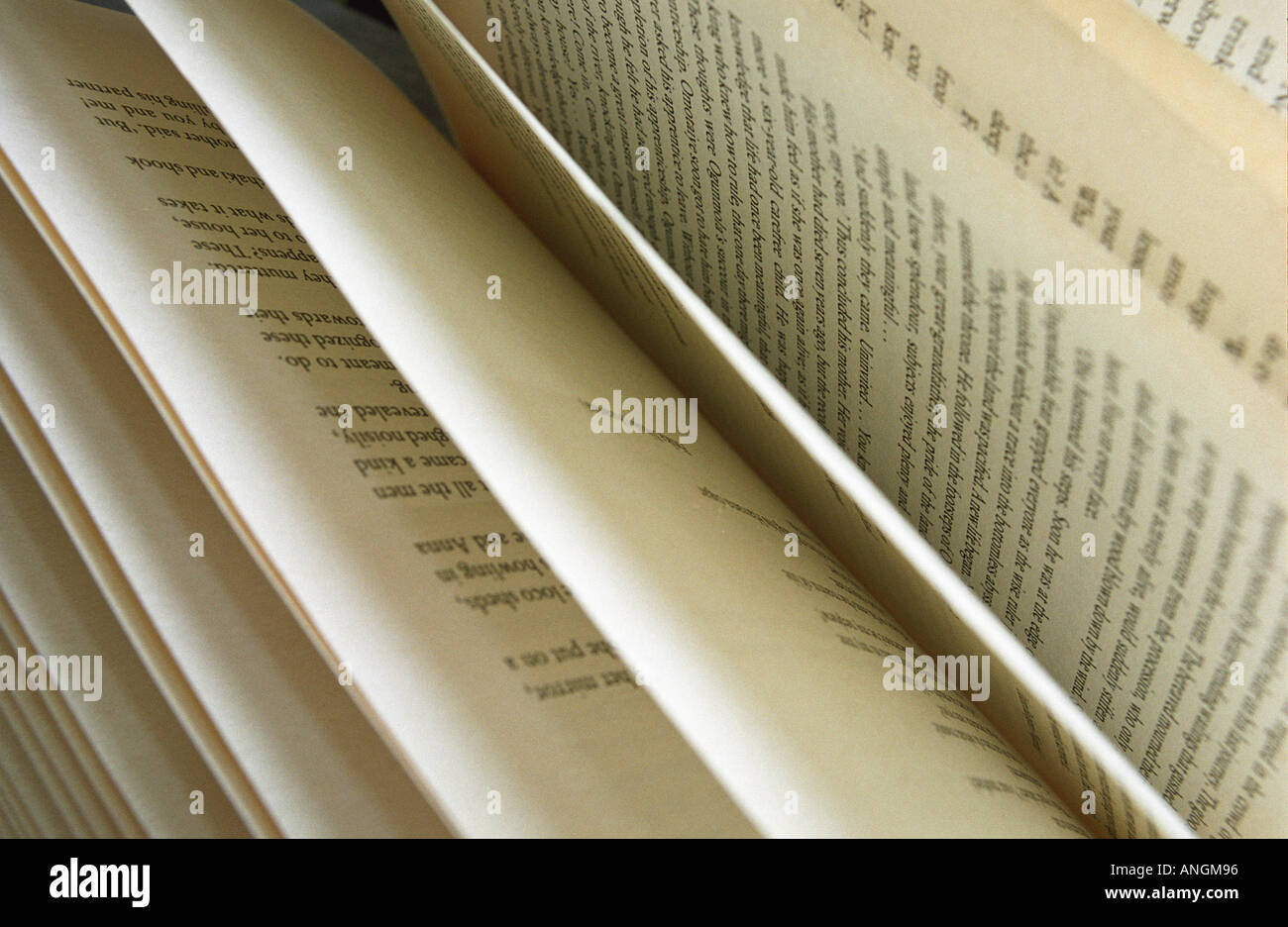 paper back with it s pages falling open Stock Photo - Alamy