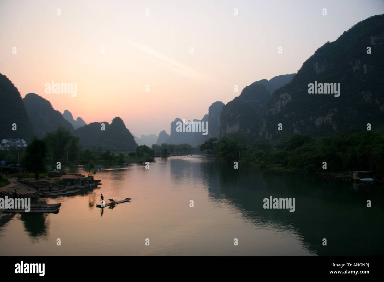 Bamboo raft on Li River near Yangshuo China at sunset Stock Photo - Alamy