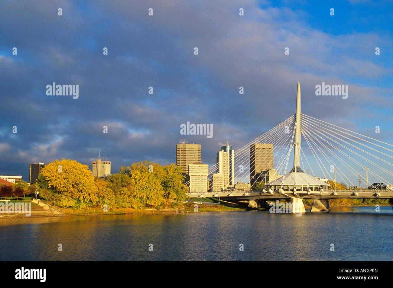 autumn along Red River with Winnipeg Skyline in the background ...