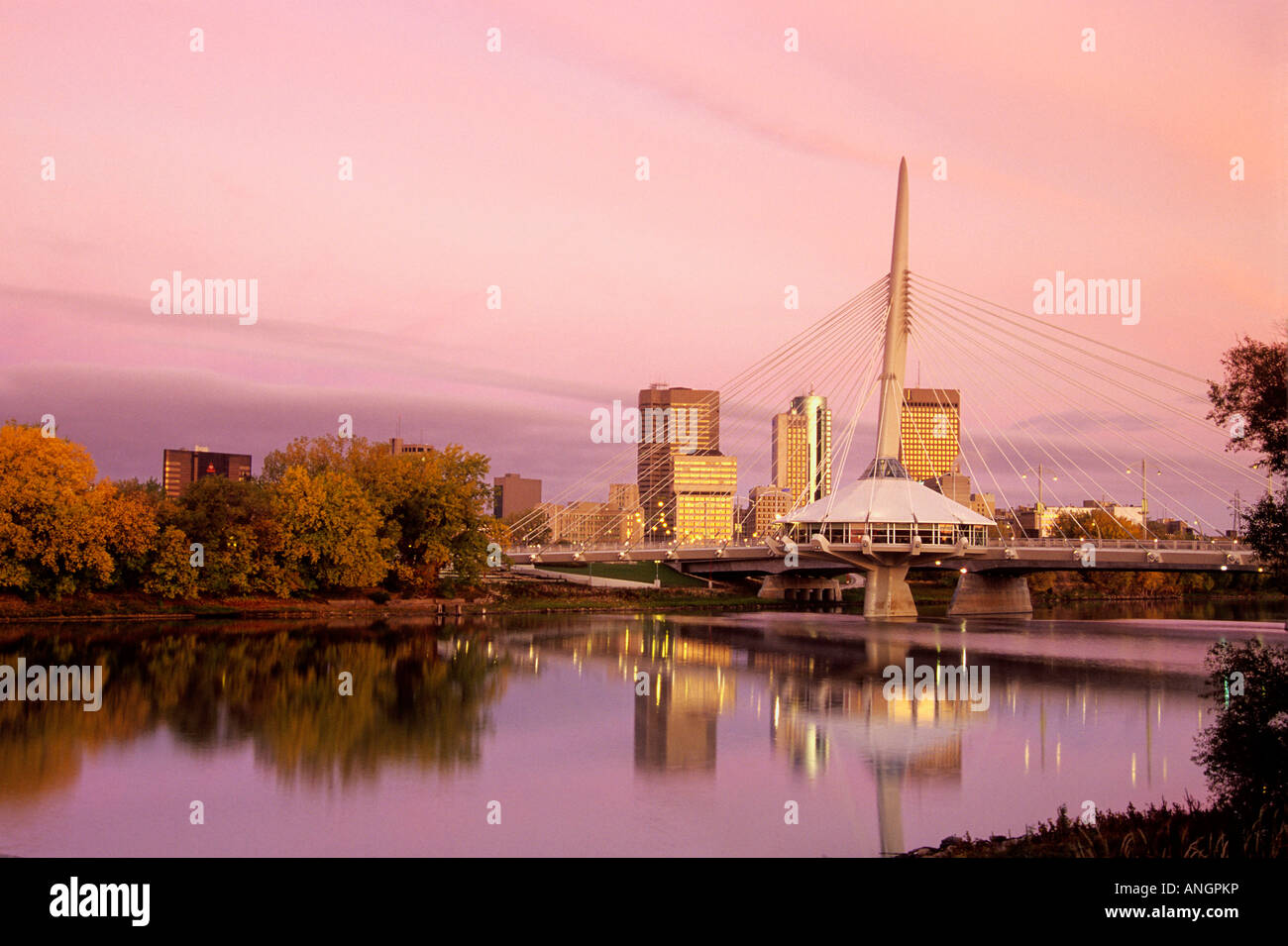 autumn along Red River with Winnipeg skyline in the background ...