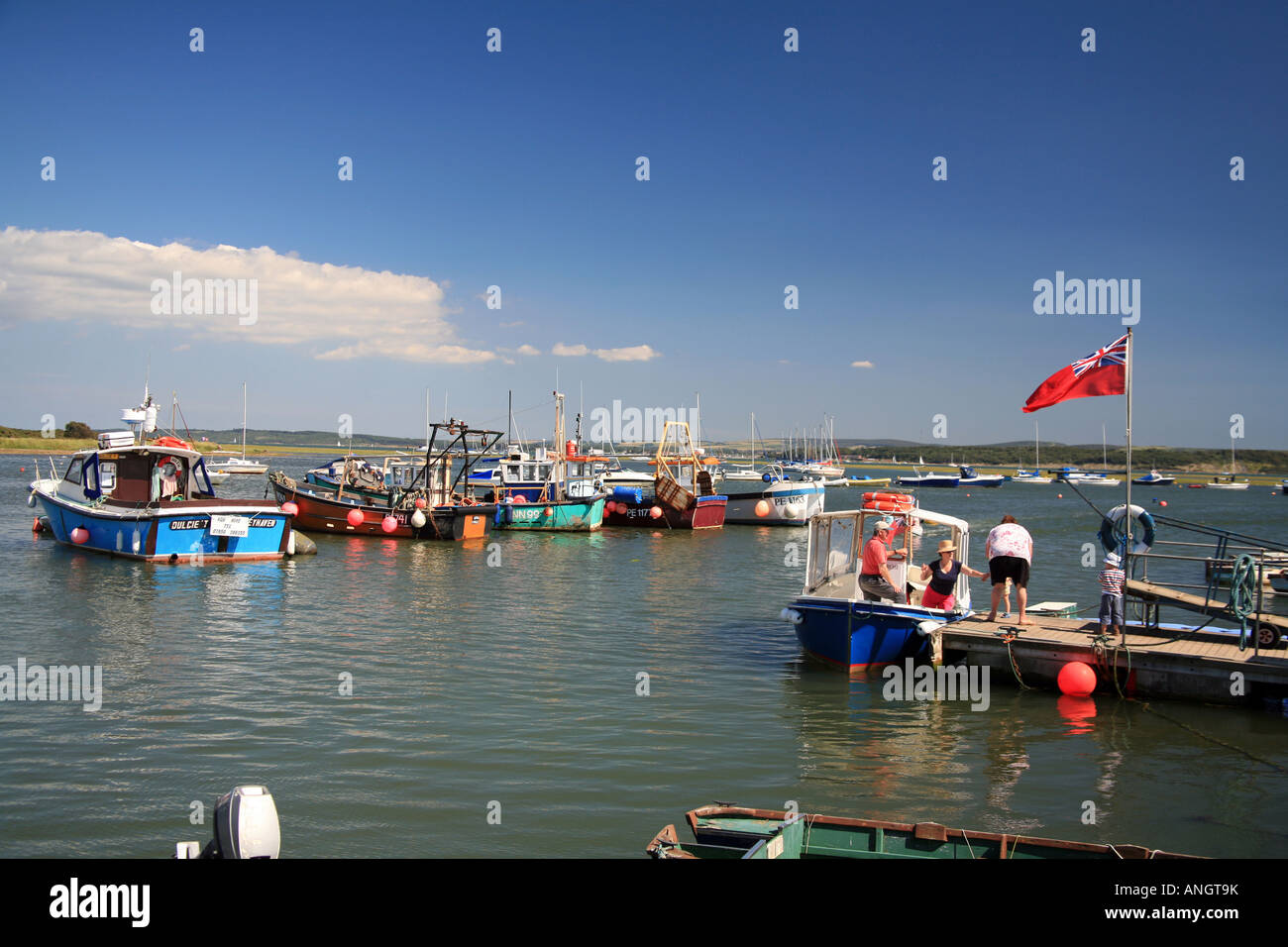 Assorted boats Keyhaven harbour Hampshire UK Stock Photo - Alamy
