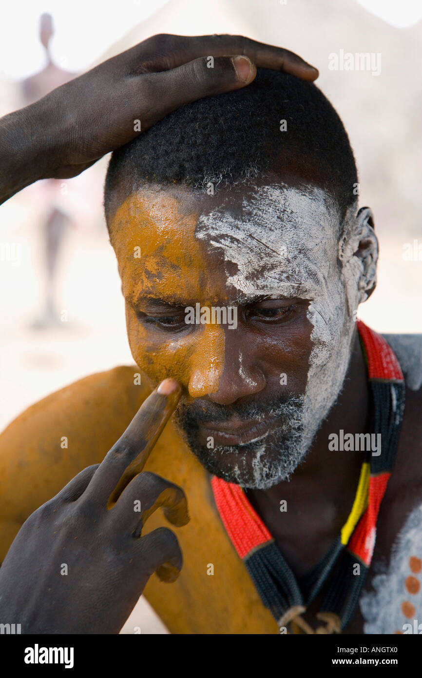 Karo Tribesman having his face painted, Lower Omo Valley, Ethiopia ...