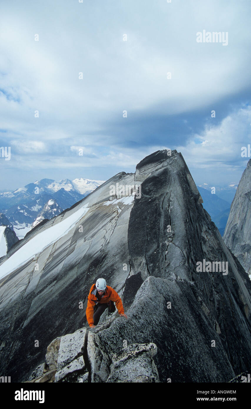 Man rock climbing on Pigeon Spire west ridge, Bugaboos, British ...