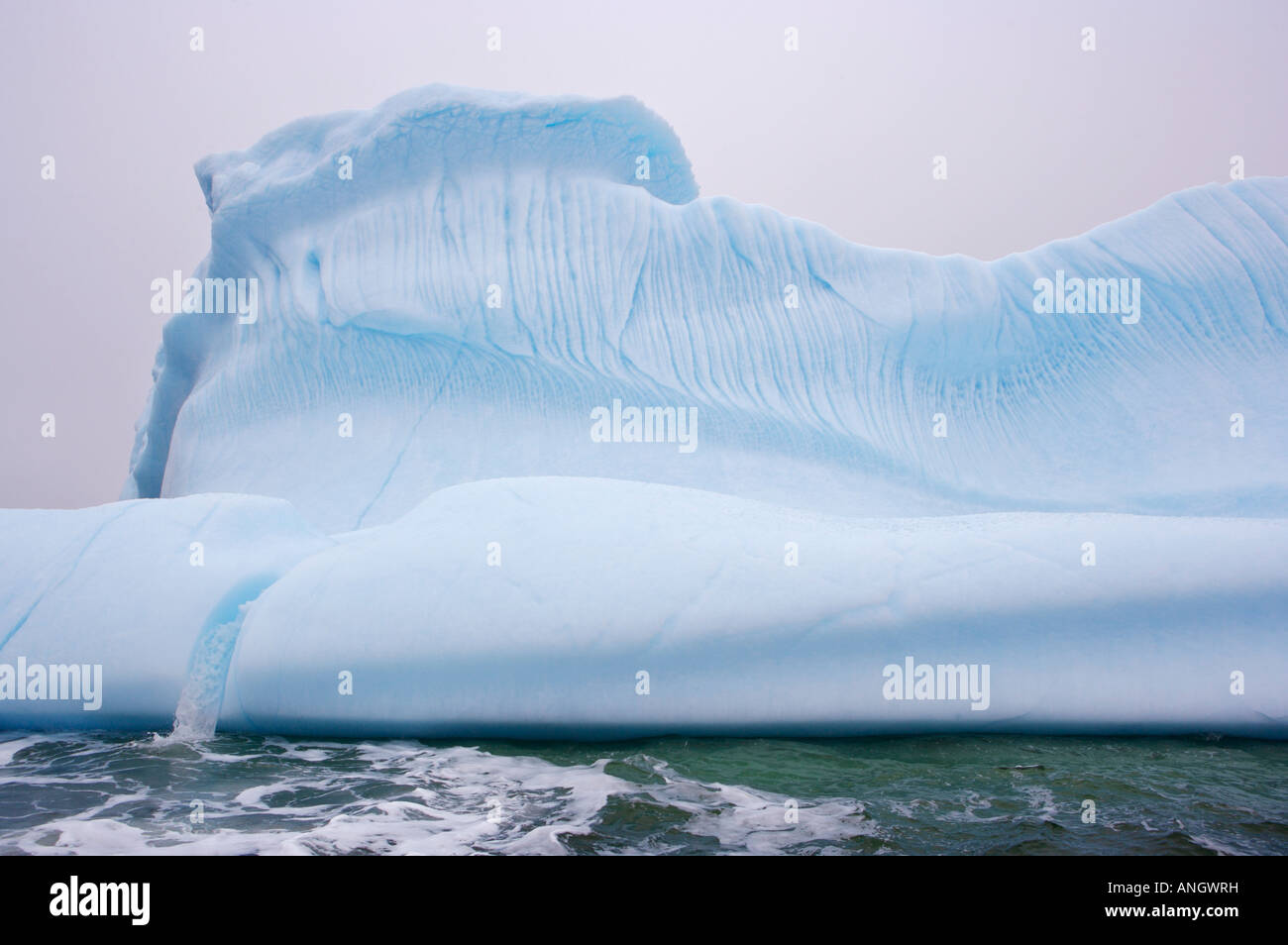 Iceberg grounded along the coast of great caribou island hi-res stock ...