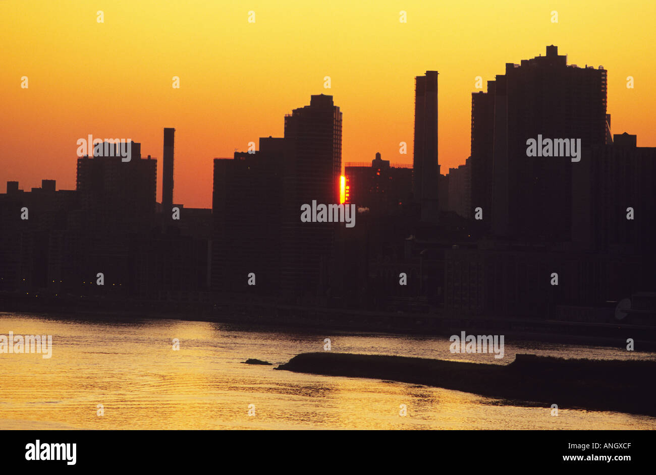 New York City Midtown Manhattan skyline silhouette and the East River ...