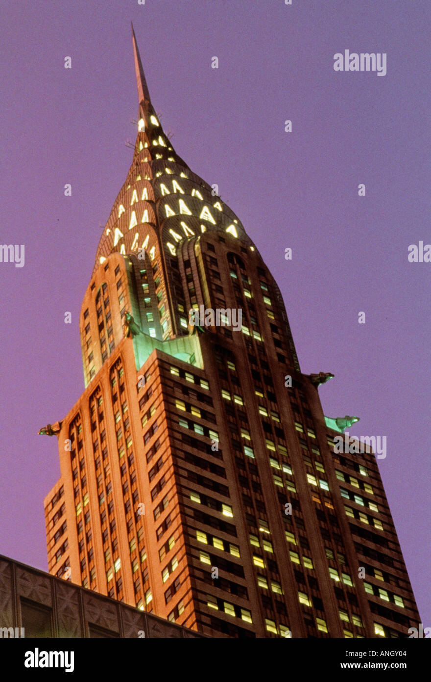 The Chrysler Building top. Art Deco skyscraper illuminated, dusk ...