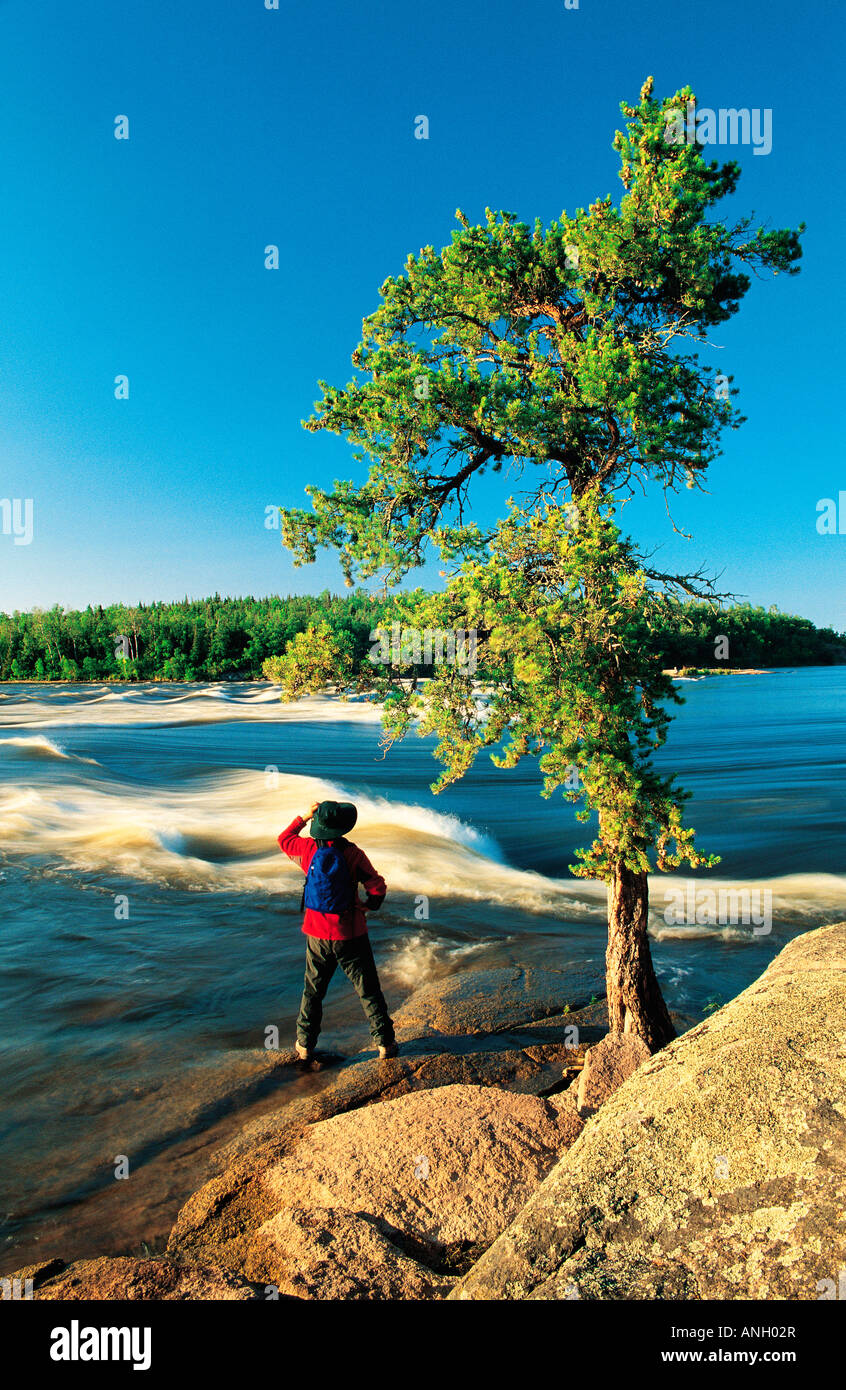 hiker at Sturgeon Falls, Whiteshell Provincial Park, Manitoba, Canada ...