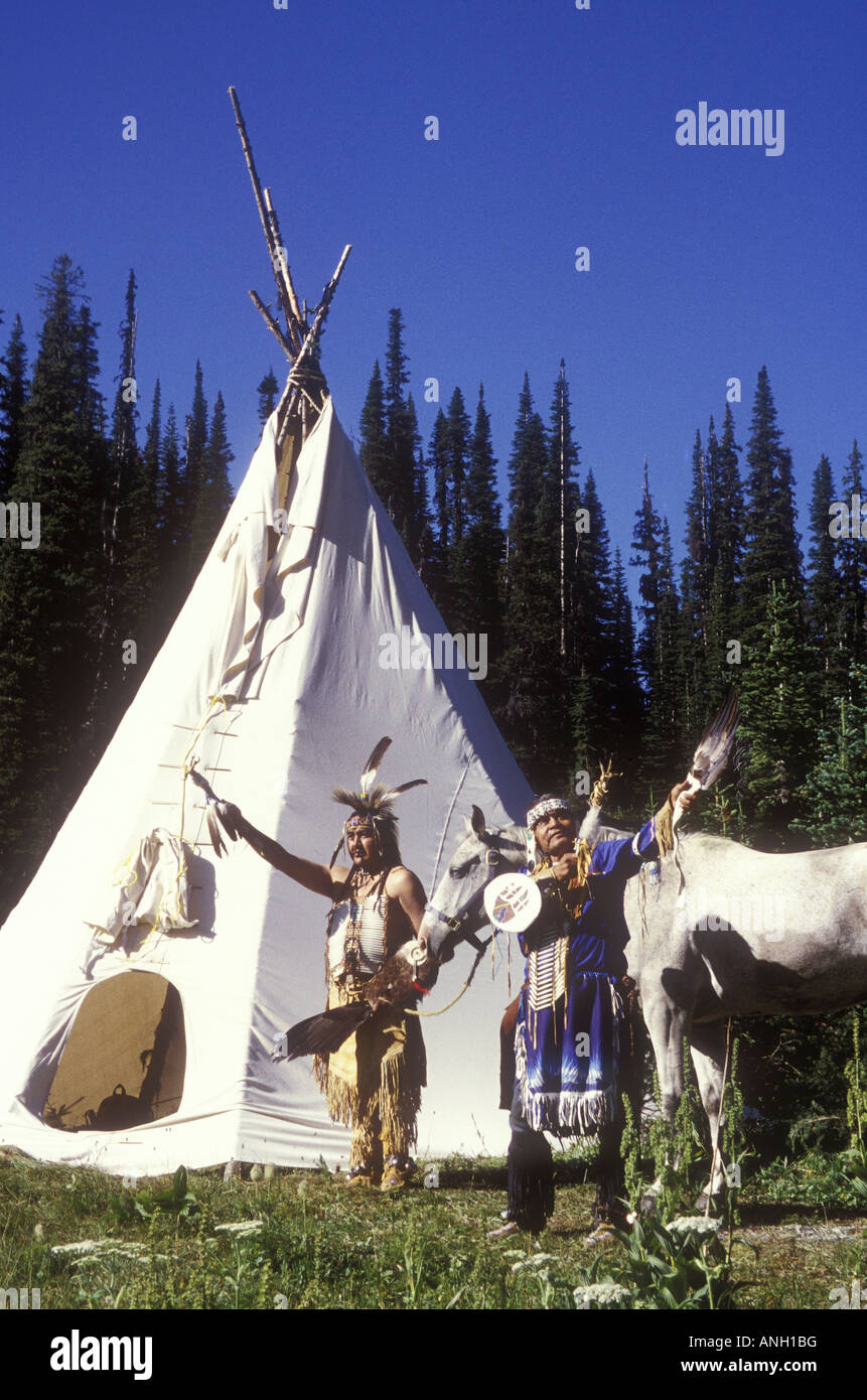 First Nations man (men) in native costume by their tee-pee, British ...