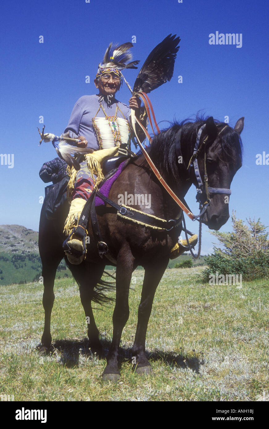 First Nations man (men) in native costume by their tee-pee, British ...