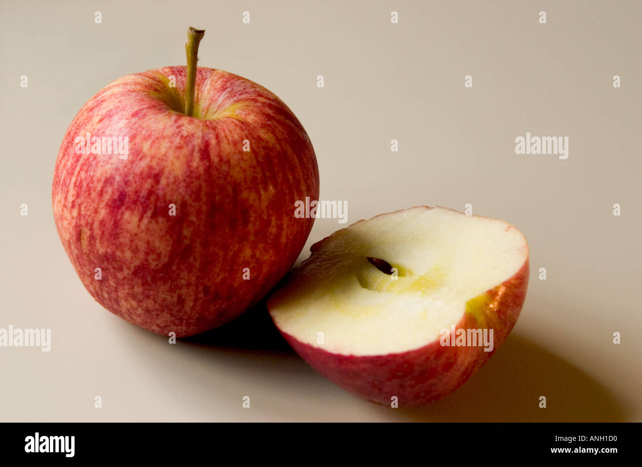 One and a Half apples Stock Photo - Alamy