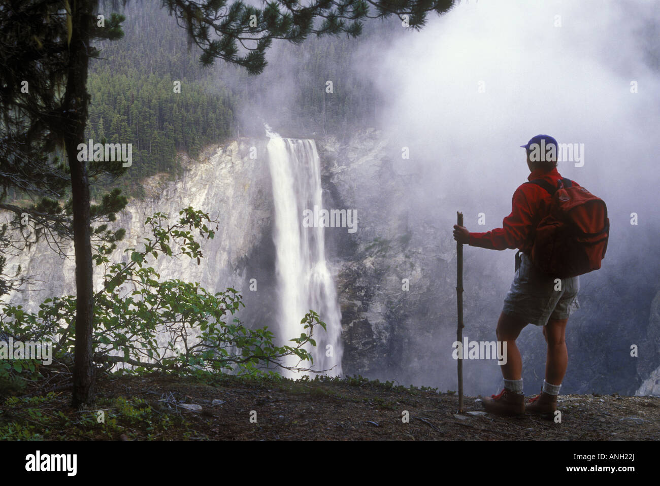 Hiker at Hunlen Falls, Tweedsmuir Park, Turner Lake Trail, British ...