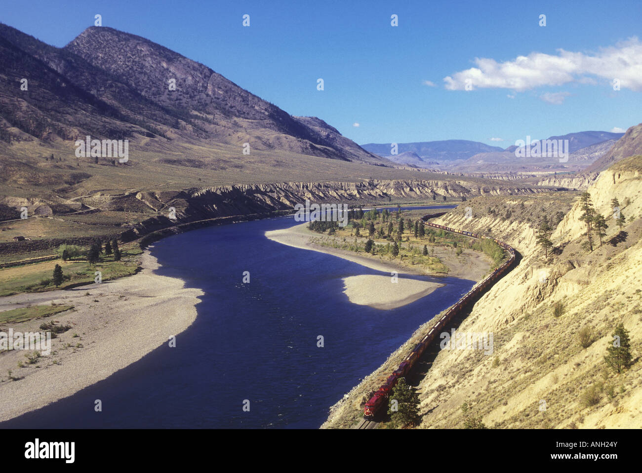 Freight train along the Thompson River, British Columbia, Canada Stock ...