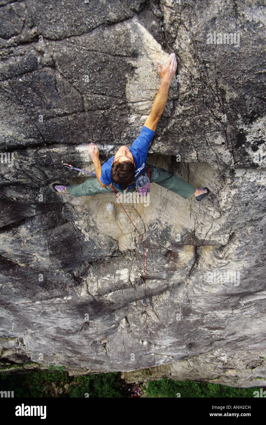Climber ascends No Name Road, Petrifying Wall, Murrin Provincial Park ...