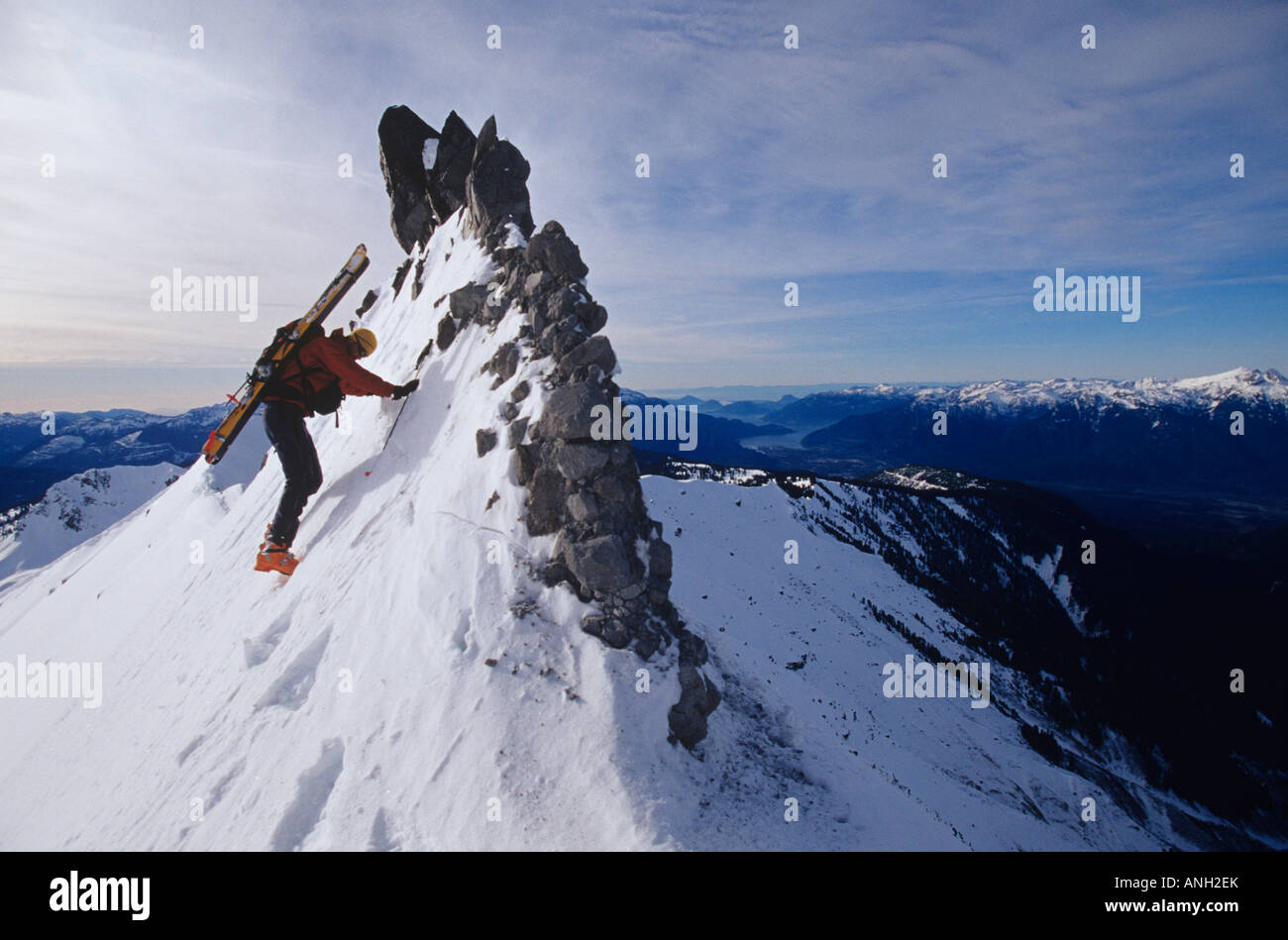 Man climbing the ridge of Mount Atwell, Garibaldi Provincial Park, near ...