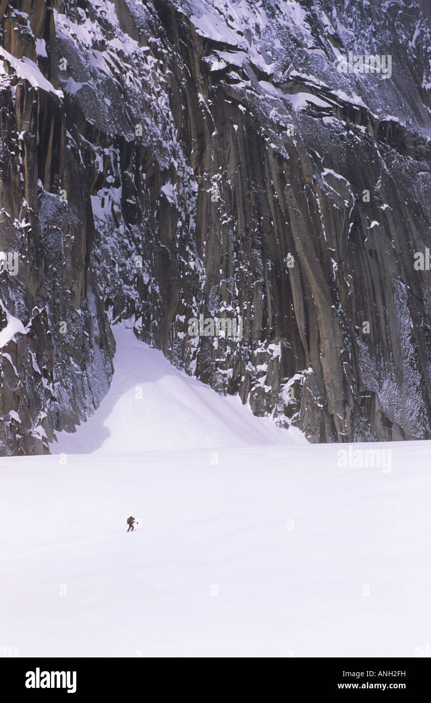 Backcountry skier underneath snowpatch spire hi-res stock photography ...