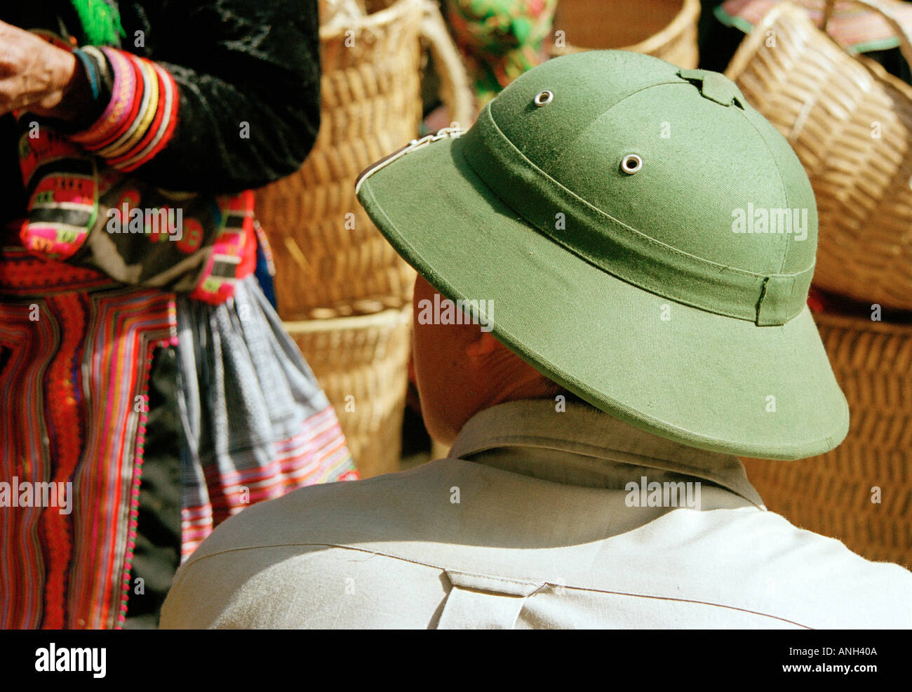 Vietnamese man in a traditional topee worn mainly by Northern ...