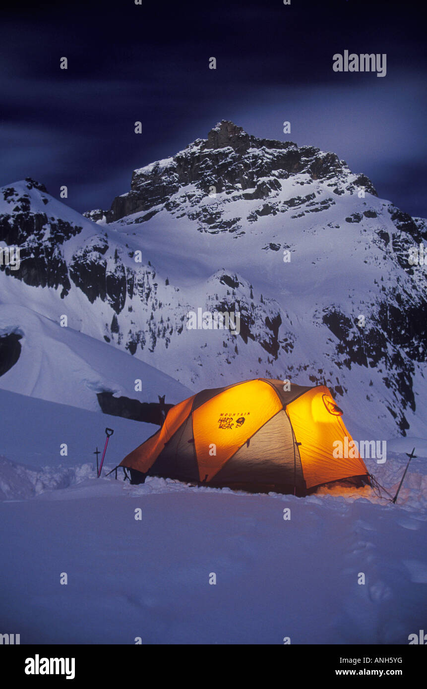 Backcountry skiers camp on moonlight night, Bugaboo Provincial Park ...