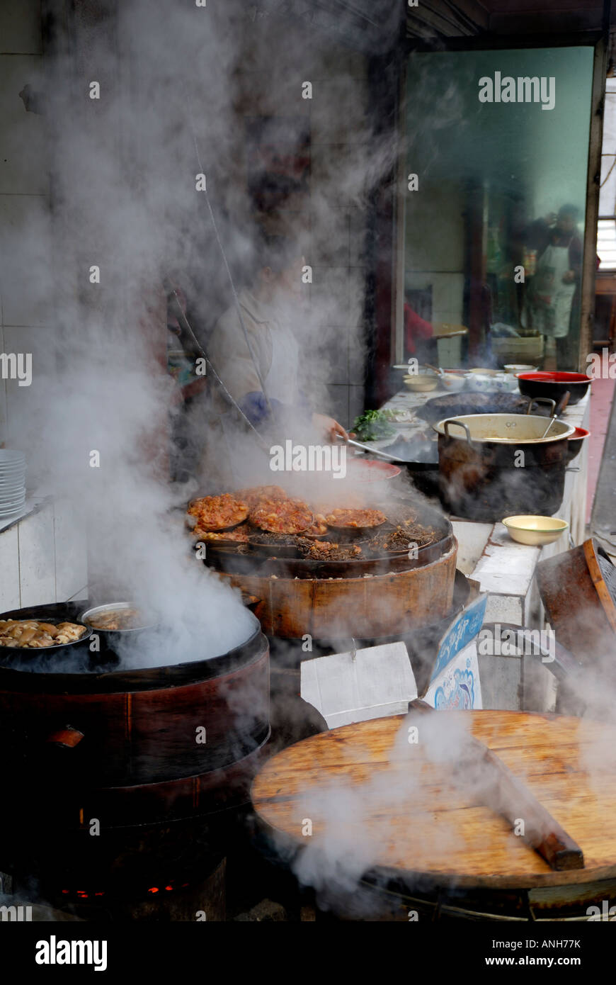 To cook (meat or vegetables) by browning in fat, then simmering in a ...